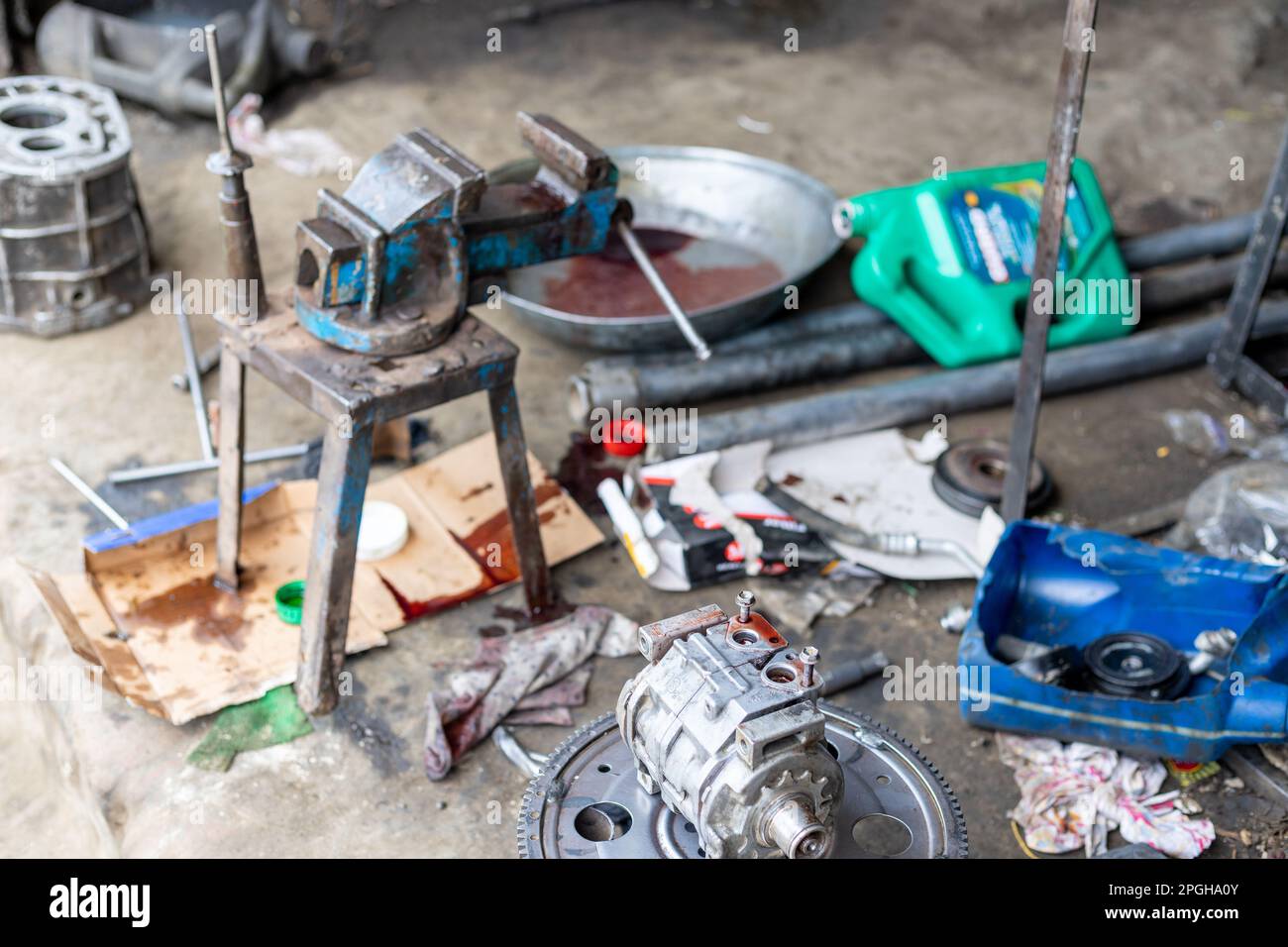 Automobile workshop with dirty and messy tools Stock Photo - Alamy