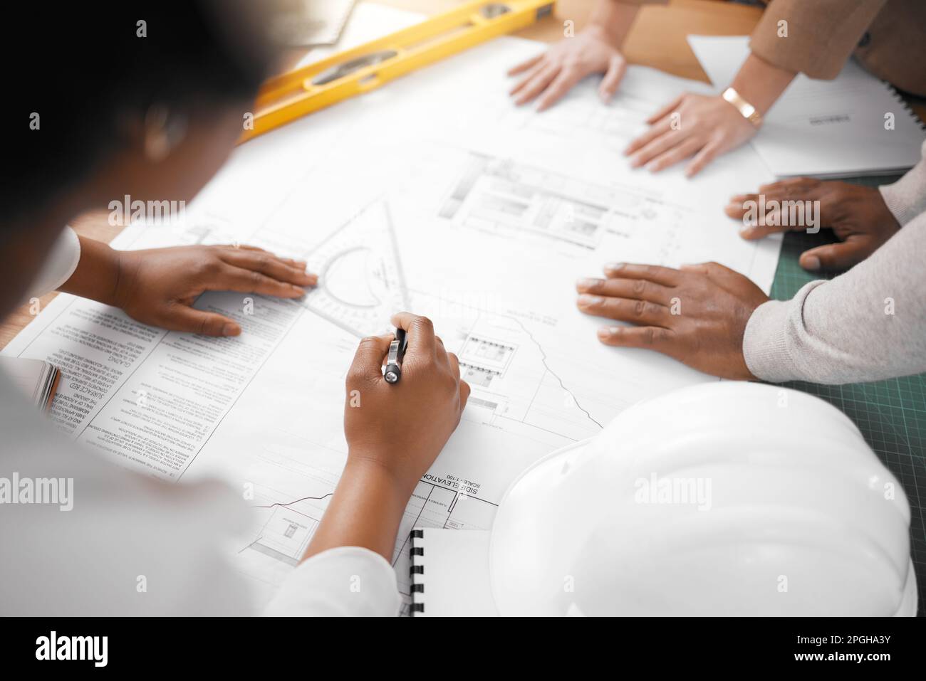 Hands, collaboration and architecture with a building team working in ...