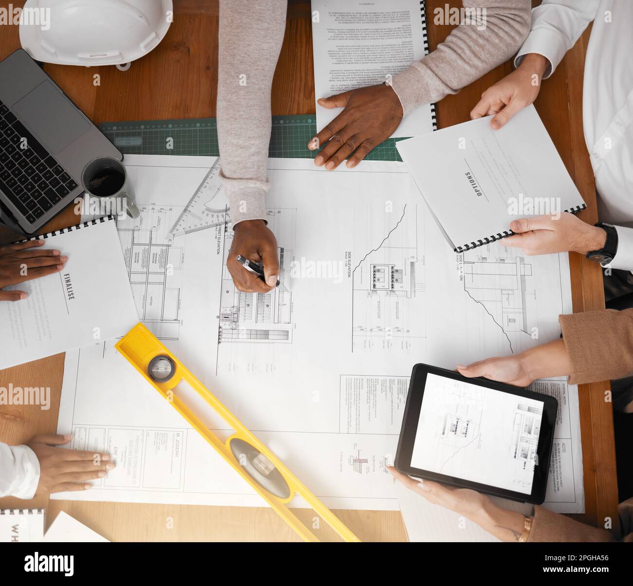 Tablet, floor plan and architecture people planning, project management ...