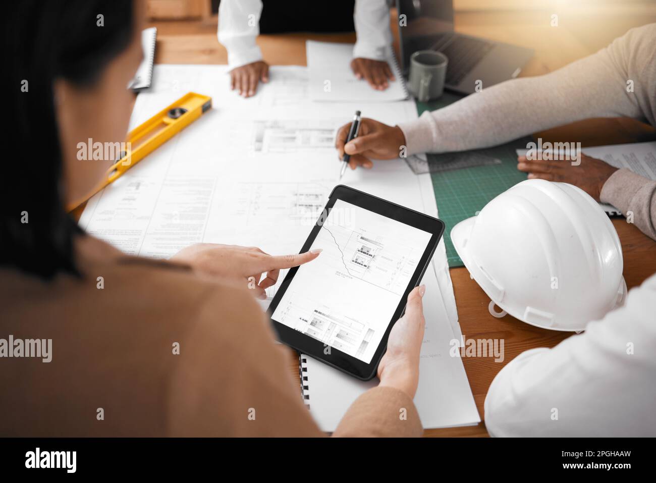 Tablet, floor plan and engineering people planning, project management ...