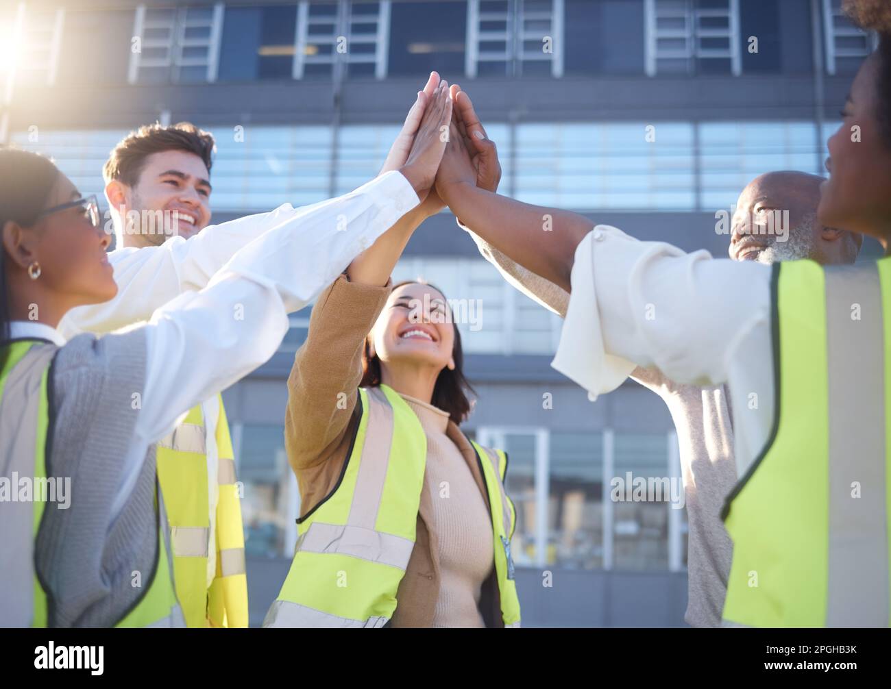 Teamwork, high five and engineering people success, support and ...