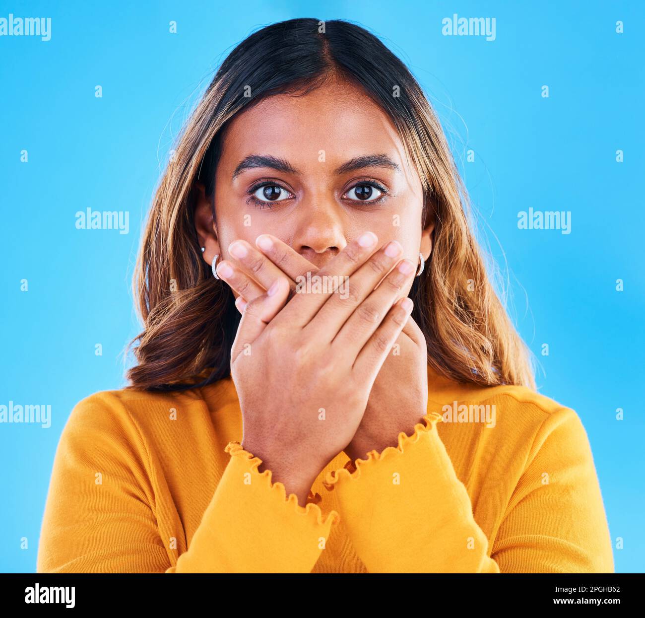 Shock, surprise and portrait of a woman in a studio with a omg, wtf or wow face expression ...