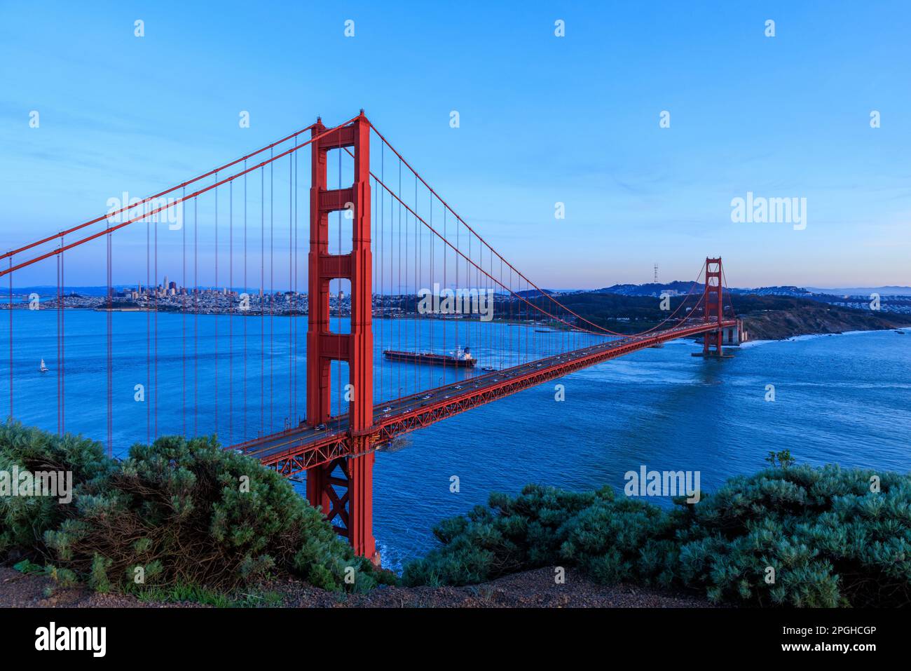 Cargo ship sails under iconic Golden Gate Bridge to San Francisco in ...