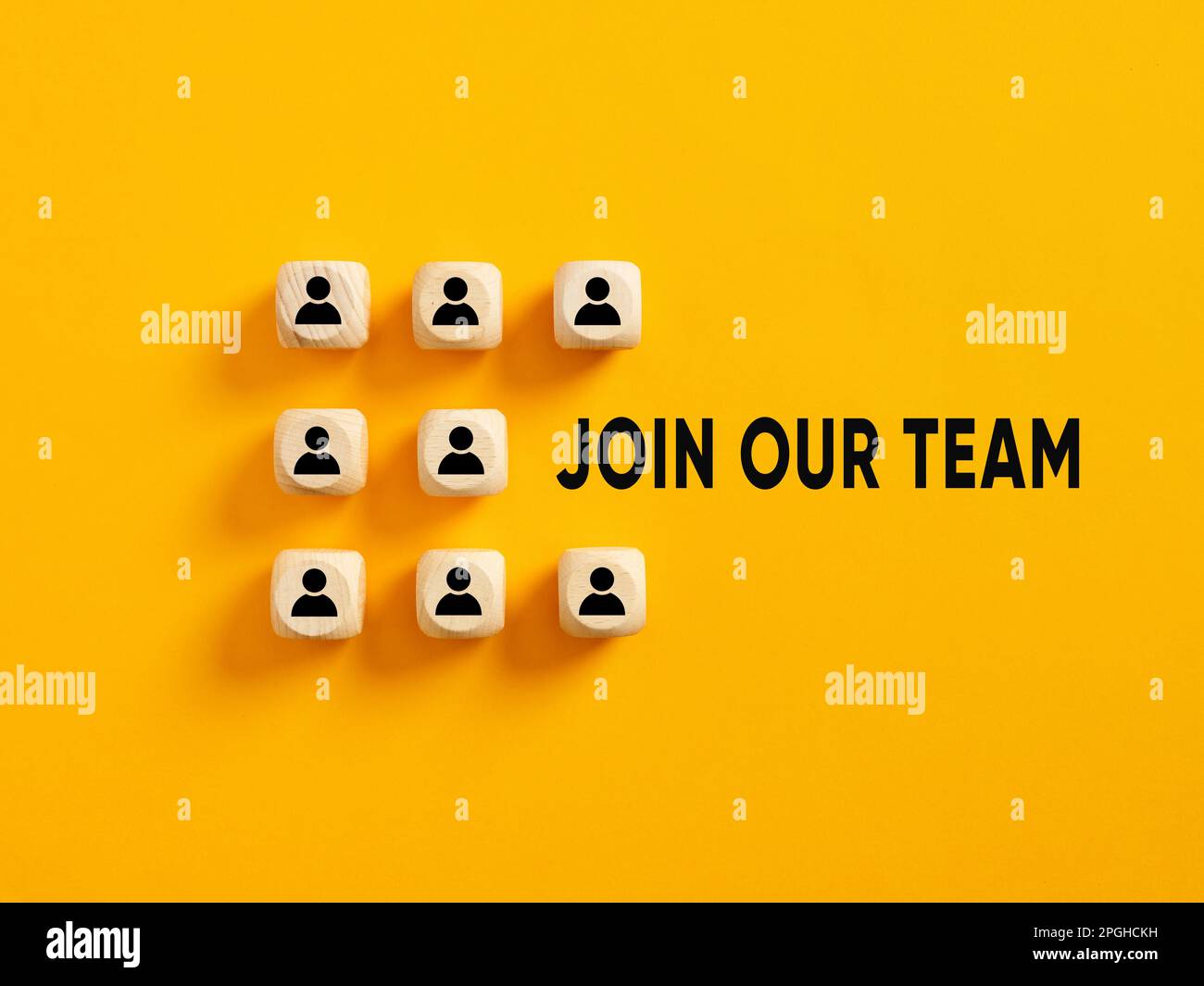 Employee symbols on wooden blocks with the message join our team. Job ...