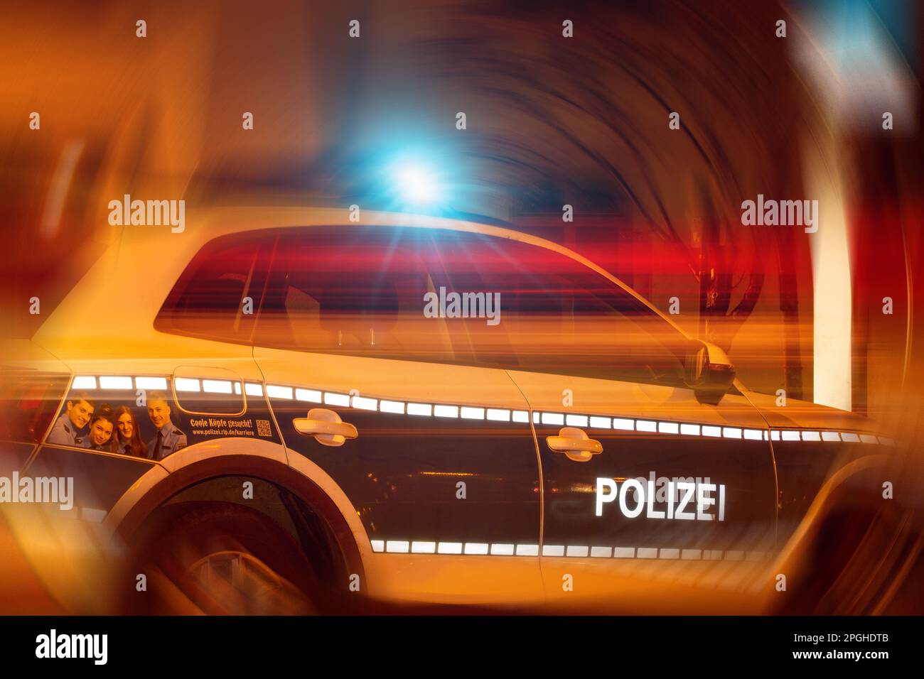 Symbol image of police action: Police car in darkness Stock Photo - Alamy