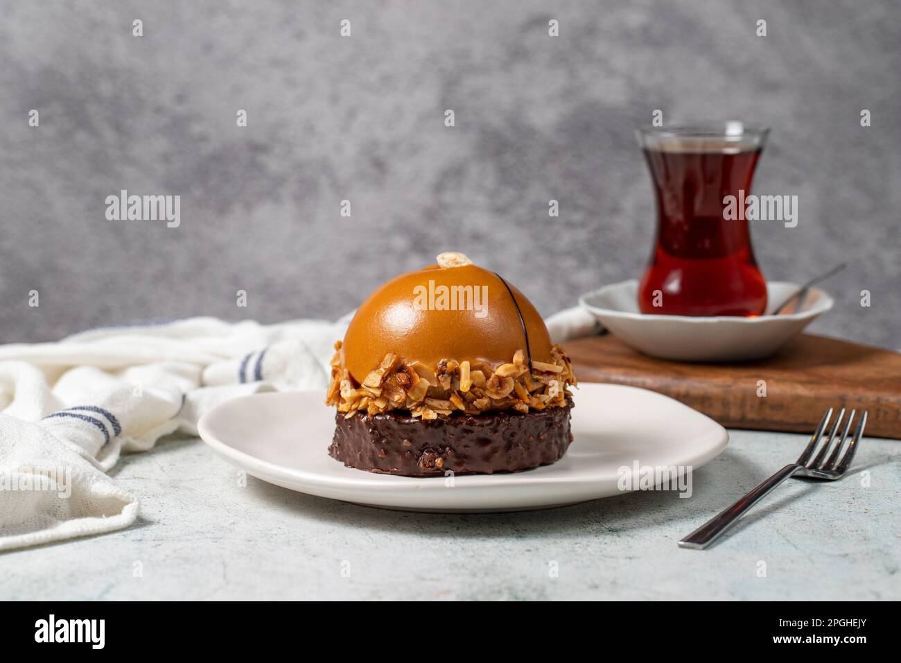 Round caramel cake. Hazelnut and cream portion cake Stock Photo - Alamy