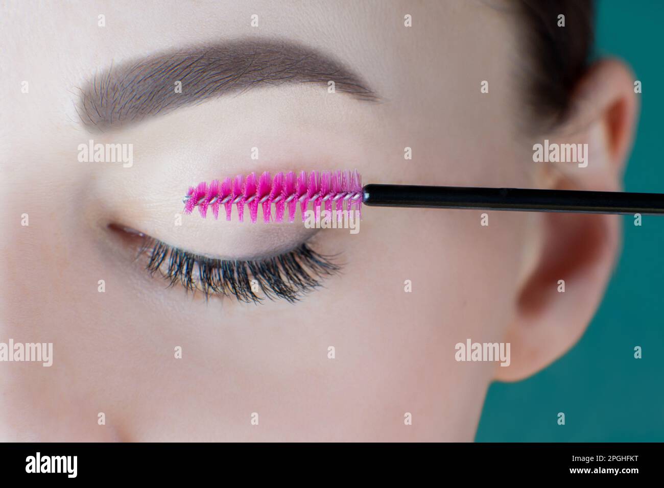 Closed eye with long eyelashes, black eyeliner, perfect skin, eyebrow ...