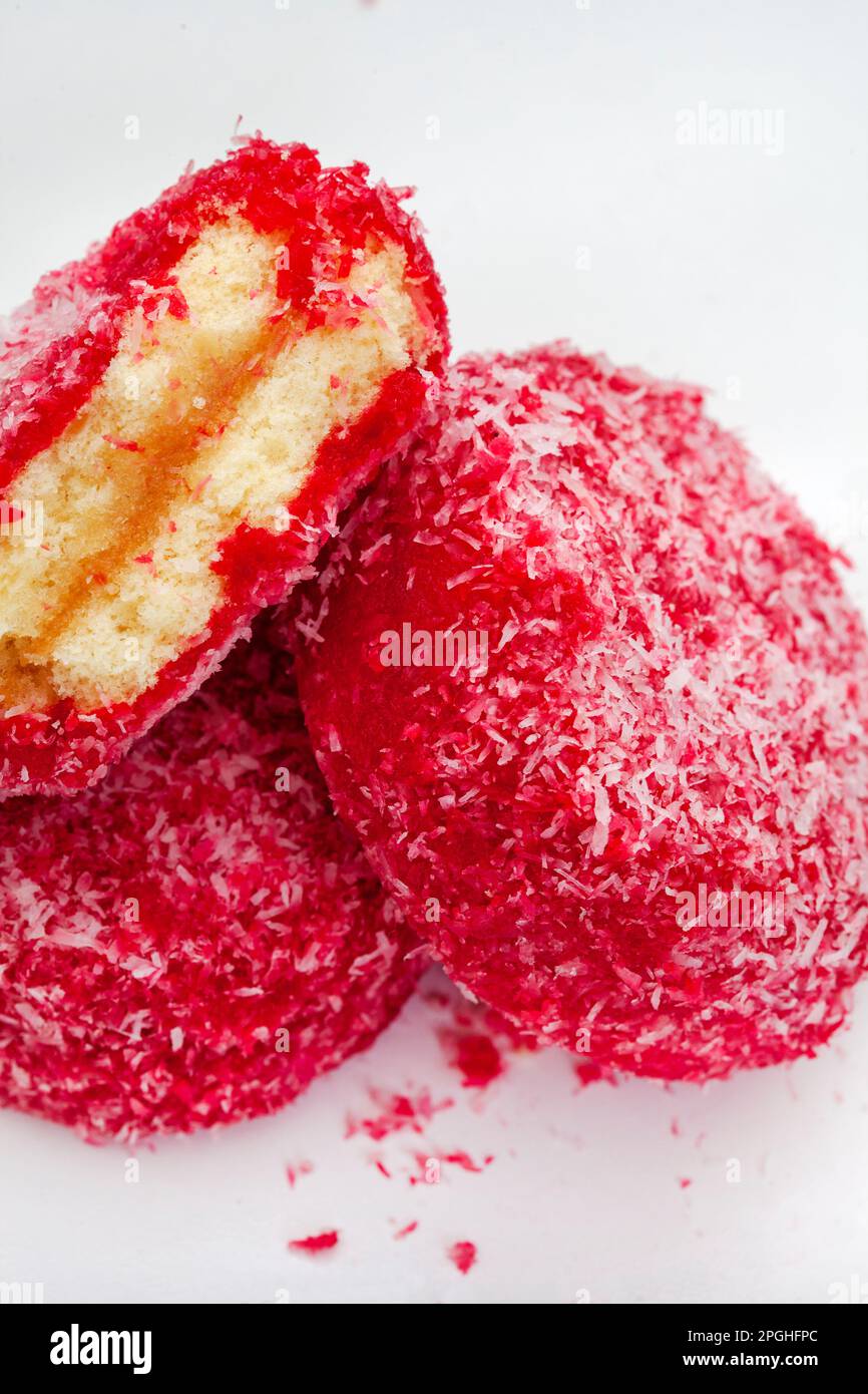 South African Snowball red cake on white background Stock Photo - Alamy