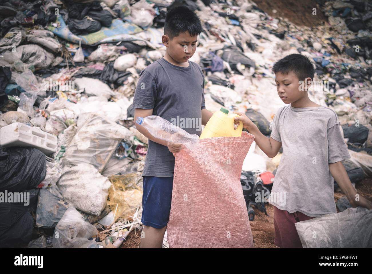 Poor children collect garbage for sale because of poverty, Junk recycle ...