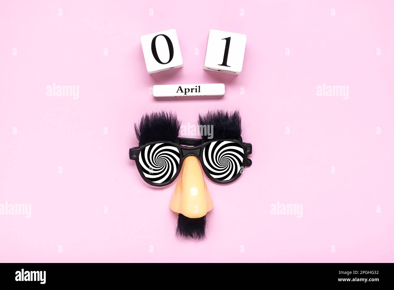 funny face - fake eyeglasses, nose and mustache, calendar with date 01 ...