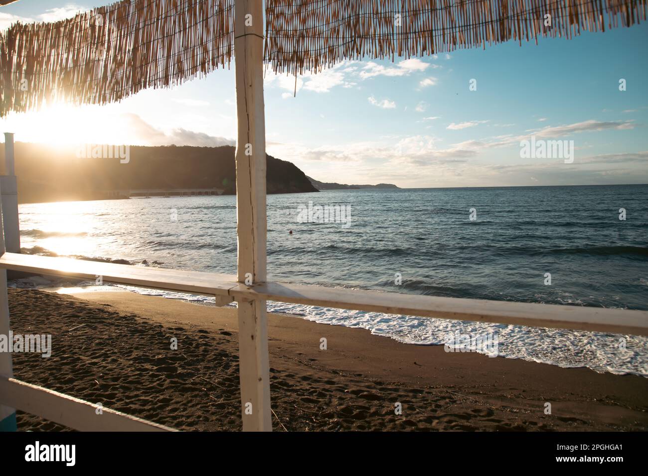 Cozy terrace on the beach, idyllic view of the seashore. Tropical ...