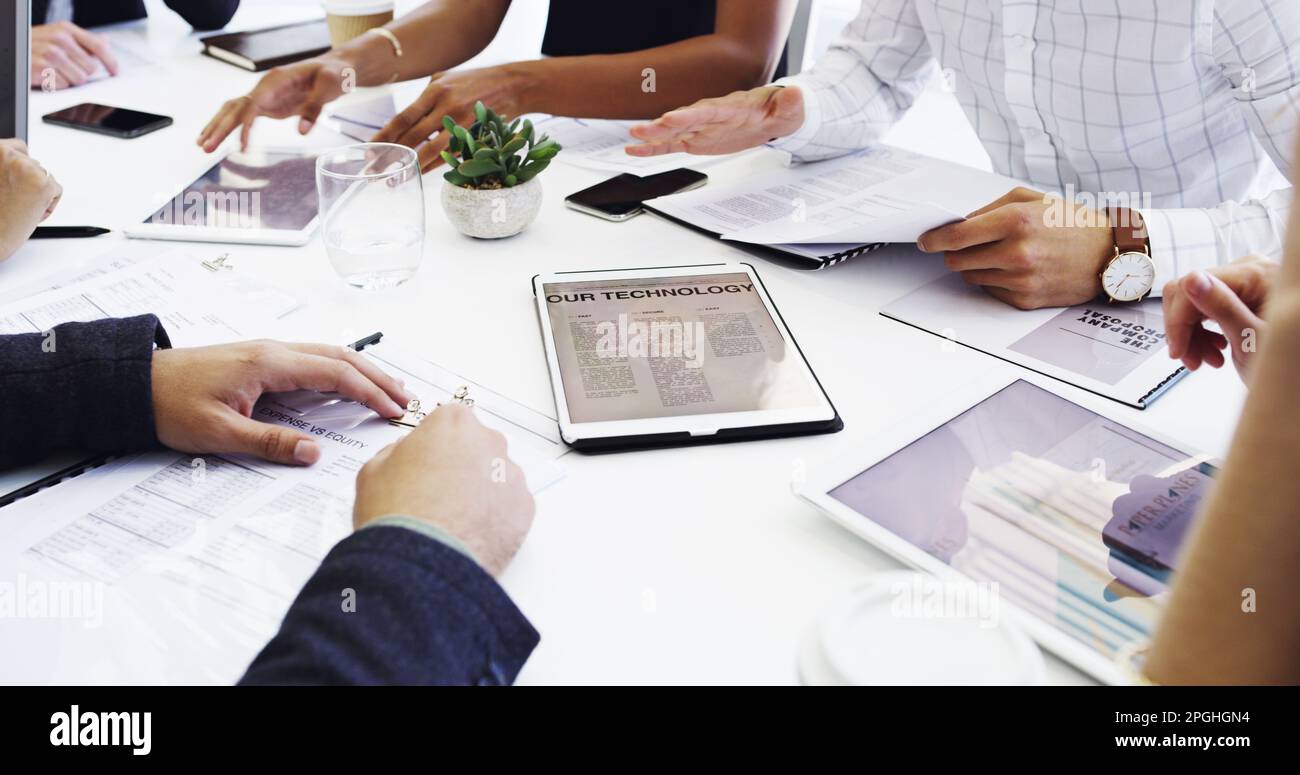 Plan, prepare and execute. a group of businesspeople sitting around the ...