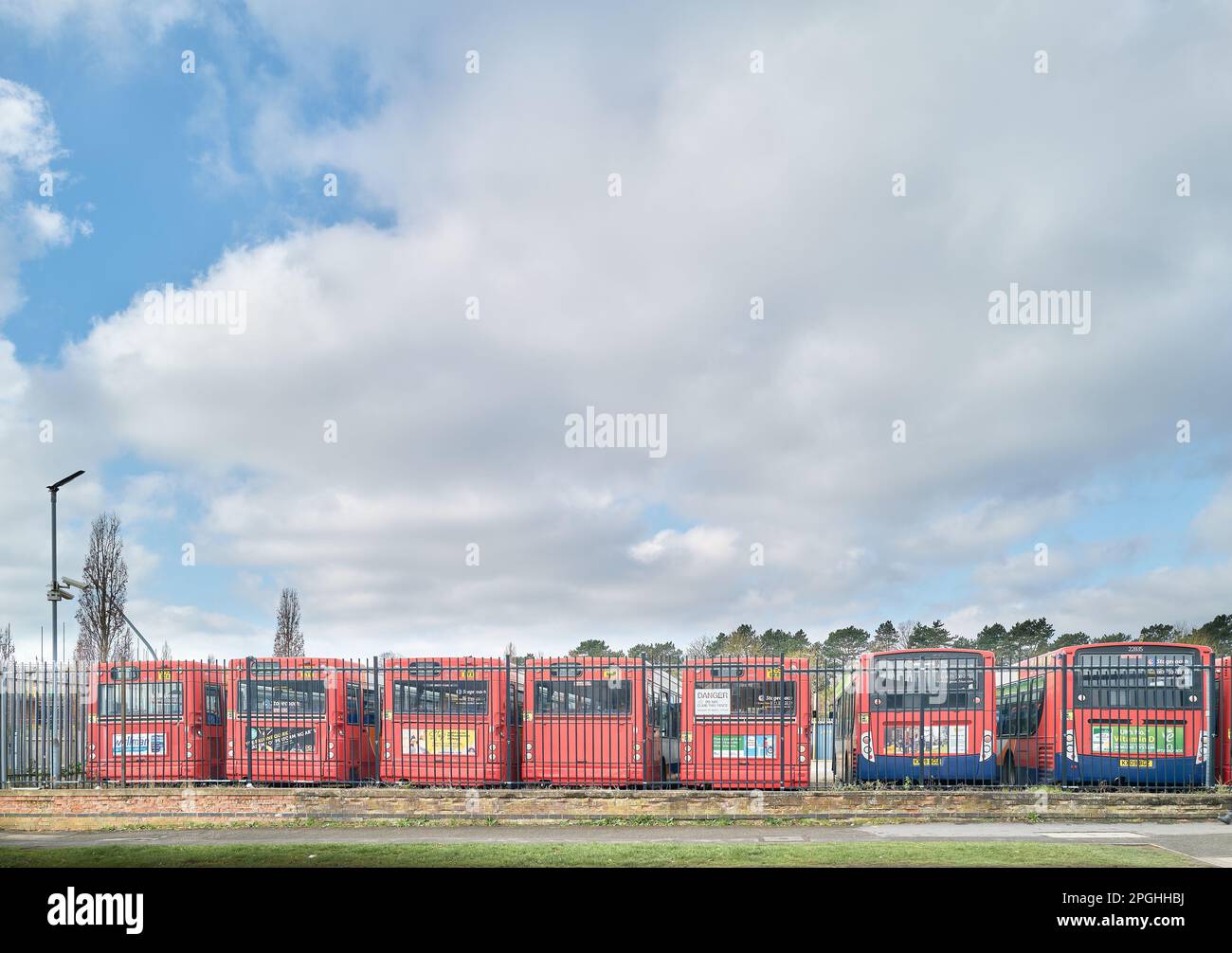 A line of single decker buses in a bus deopt, Corby, England Stock ...