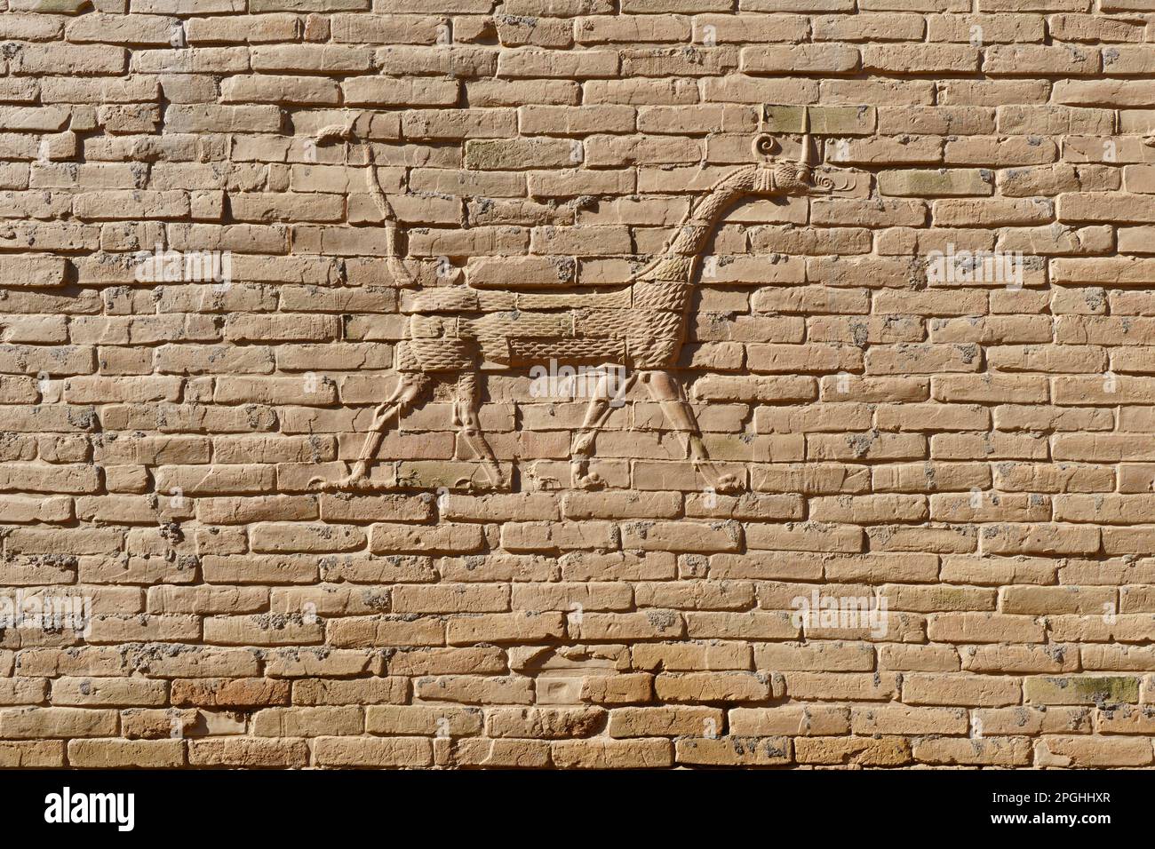 Landscape Close Up View Of A Brick Wall With The Mythological Mušḫuššu Dragon On It Inside