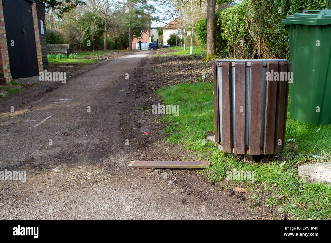 Wooden slat on a littler bin shockingly lays unattended after fainting Stock Photo - Alamy