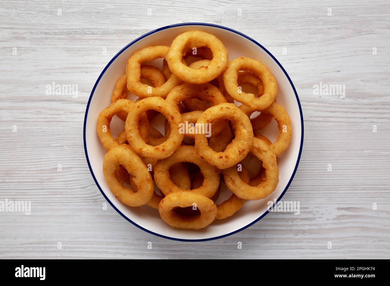 Homemade Breaded Onion Rings on a Plate, top view. Flat lay, overhead ...