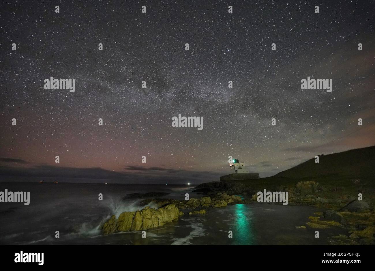 The Milky Way core rises at 3.00am over Bamburgh Lighthouse in ...