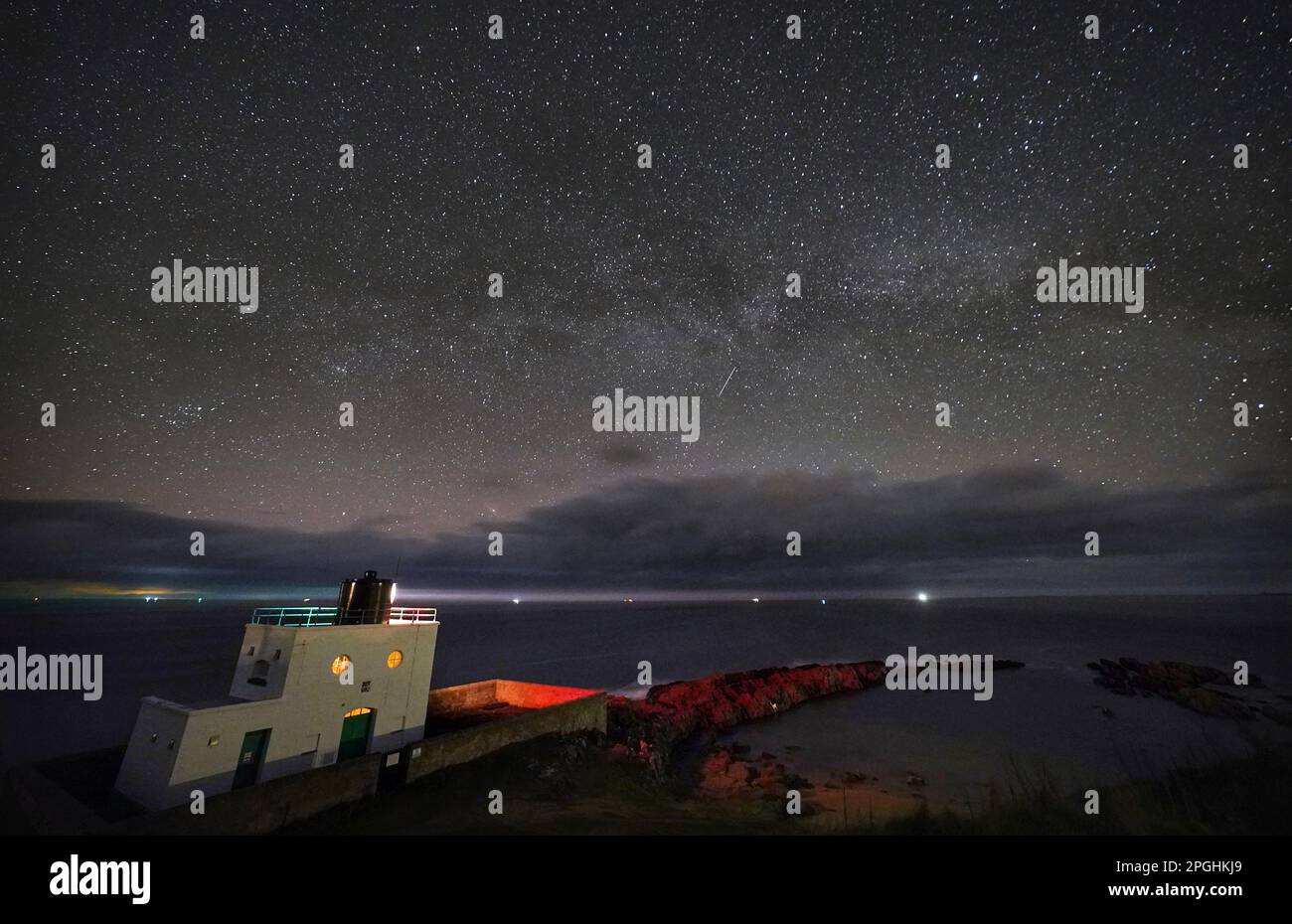 The Milky Way core rises at 3.00am over Bamburgh Lighthouse in ...