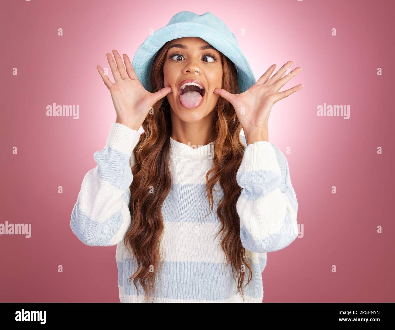 Fashion, comic hands and face of woman on studio background for funny ...