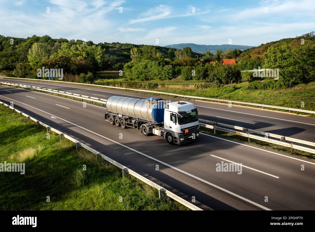 Orange road tanker moving hi-res stock photography and images - Alamy