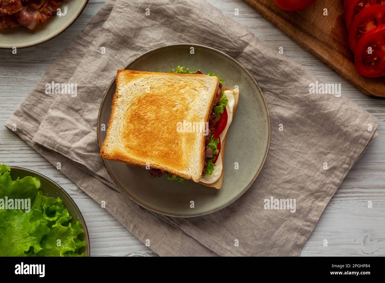 Homemade BLT Sandwich (Bacon, Lettuce and Tomato) on a Plate, top view ...
