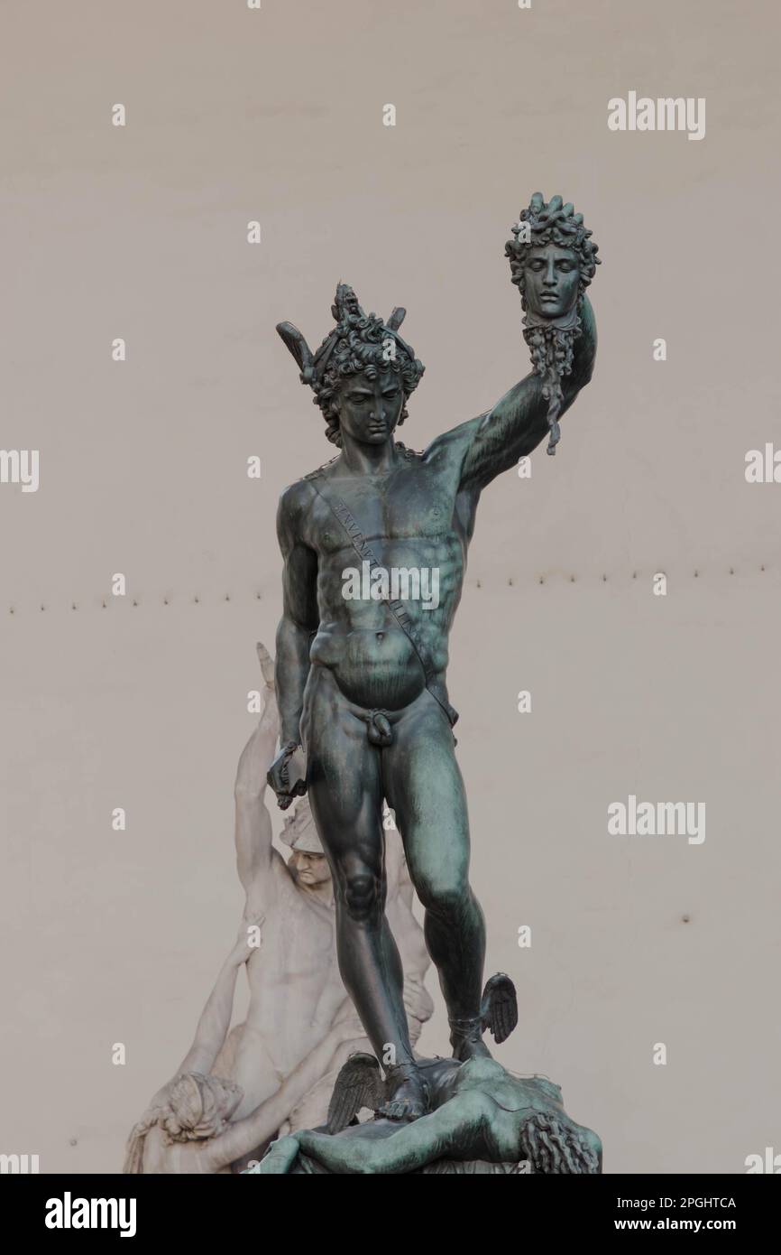 A vertical image of the Greek mythological figure Perseus holding the ...