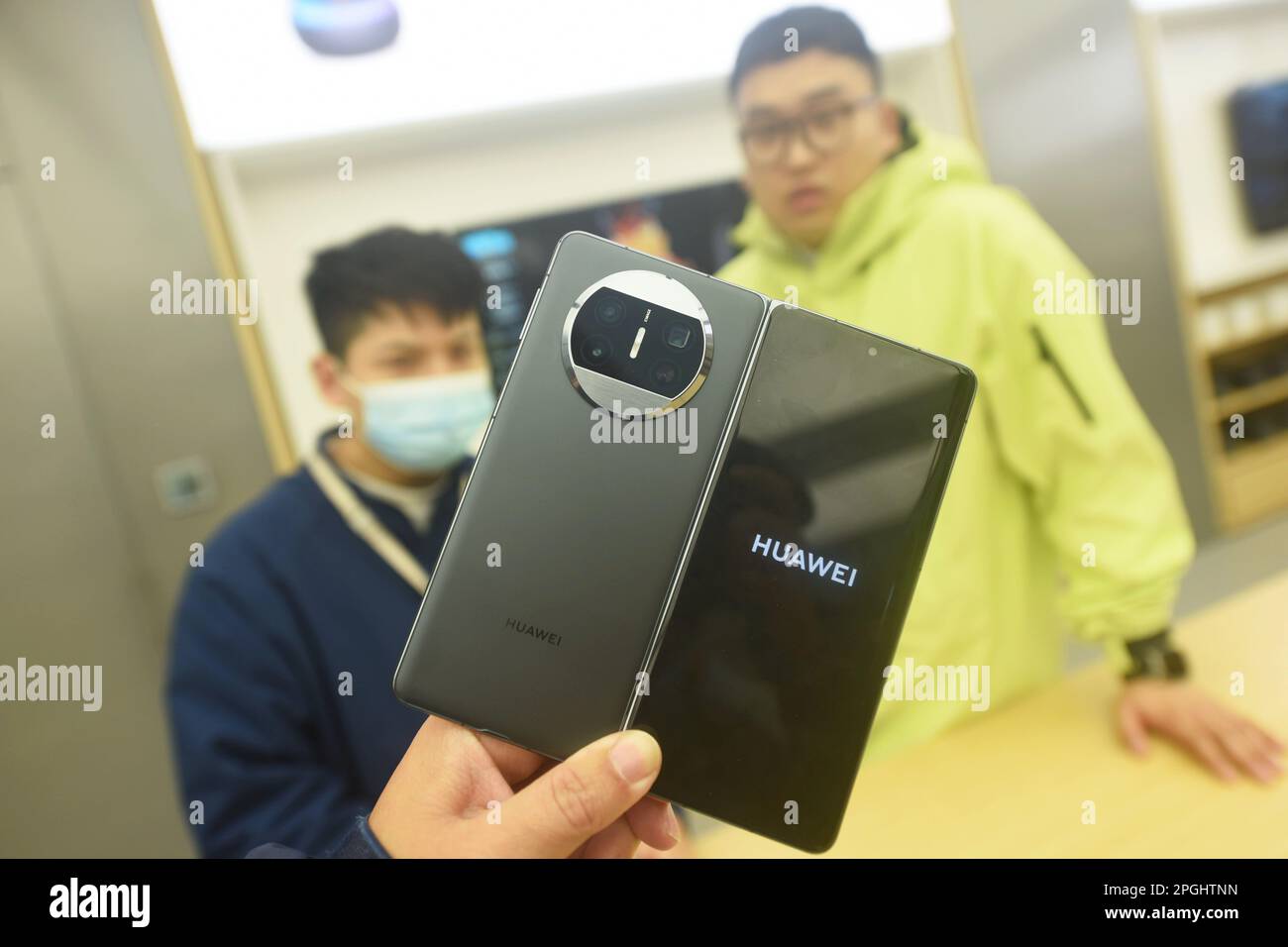 HANGZHOU, CHINA - MARCH 23, 2023 - Customers experience the just ...