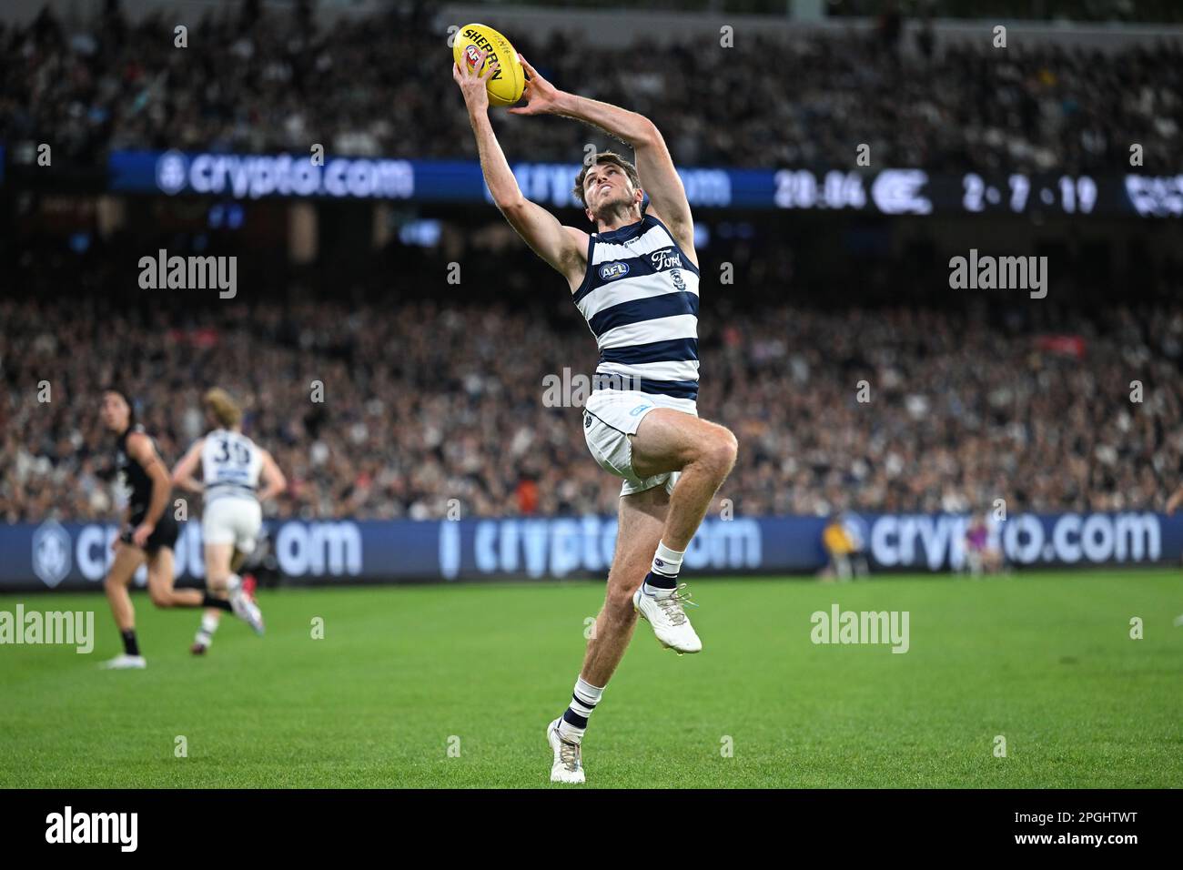Isaac Smith of Geelong marks the footy during the AFL Round 2 match ...