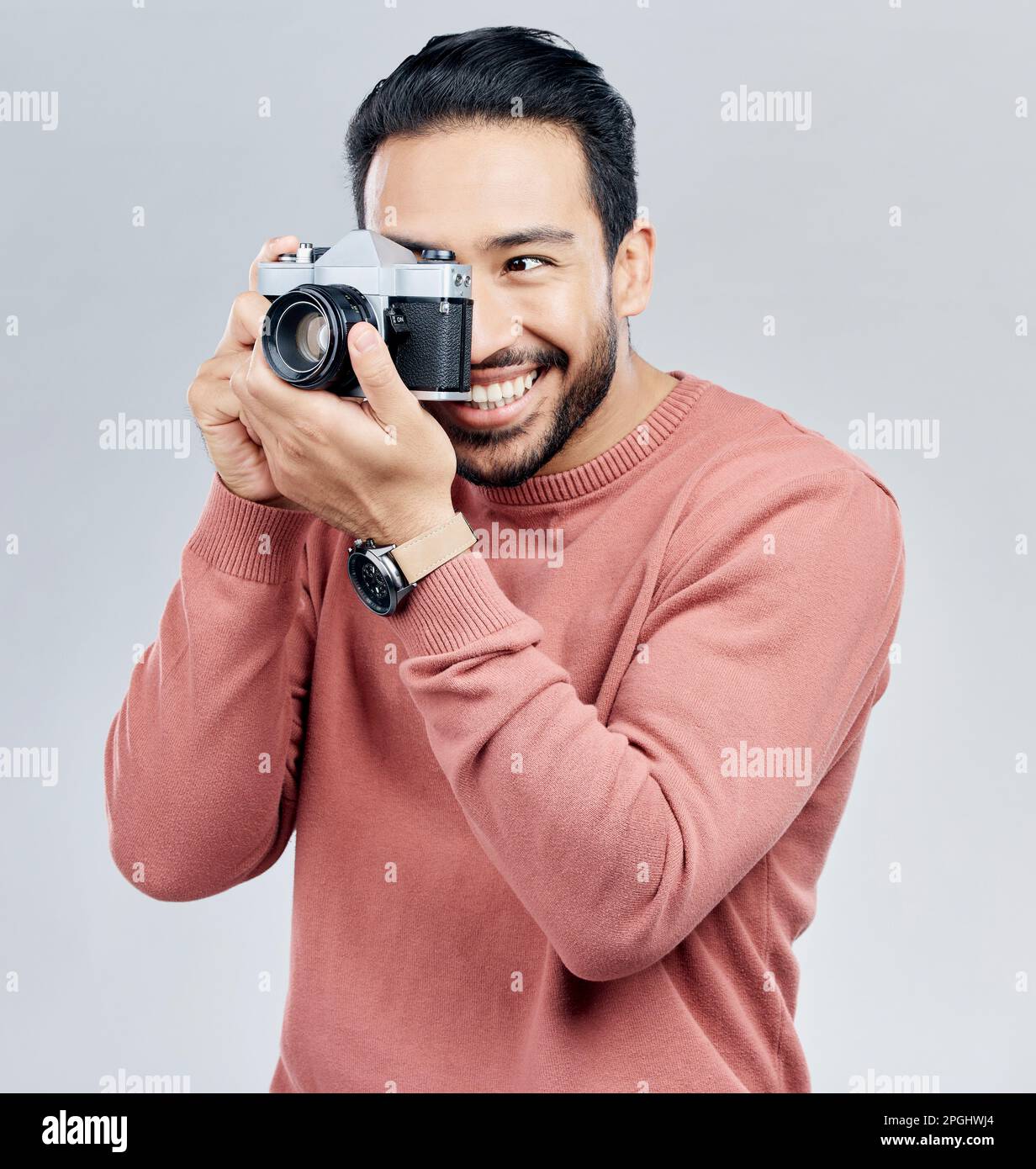 Man with camera, photography and happy with smile, taking picture with ...