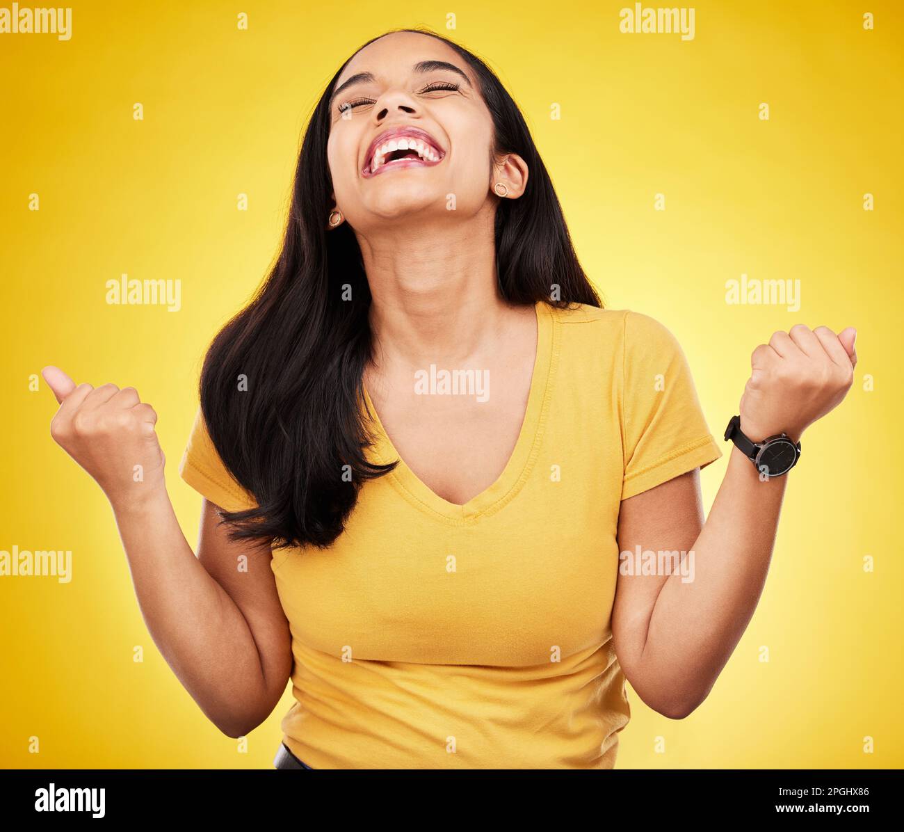 Woman, happy and fist of winner in studio for celebration, achievement ...