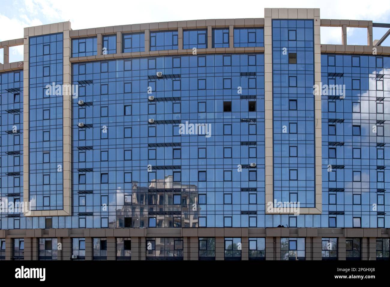 Construction of a modern high-rise building. Real estate and corporate ... Construction of a modern high-rise building. Real estate and corporate ...