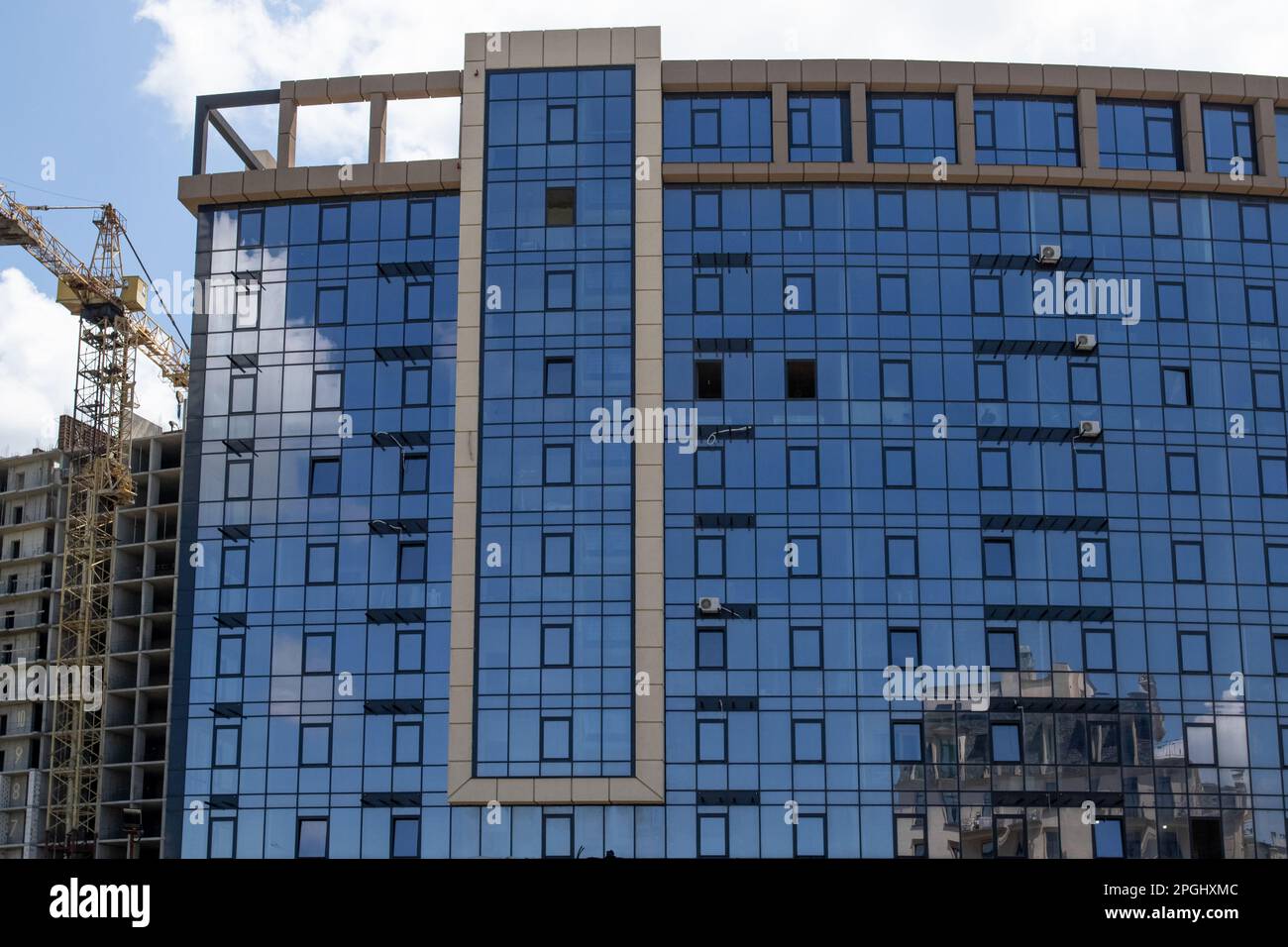 Construction of a modern high-rise building. Real estate and corporate ...
