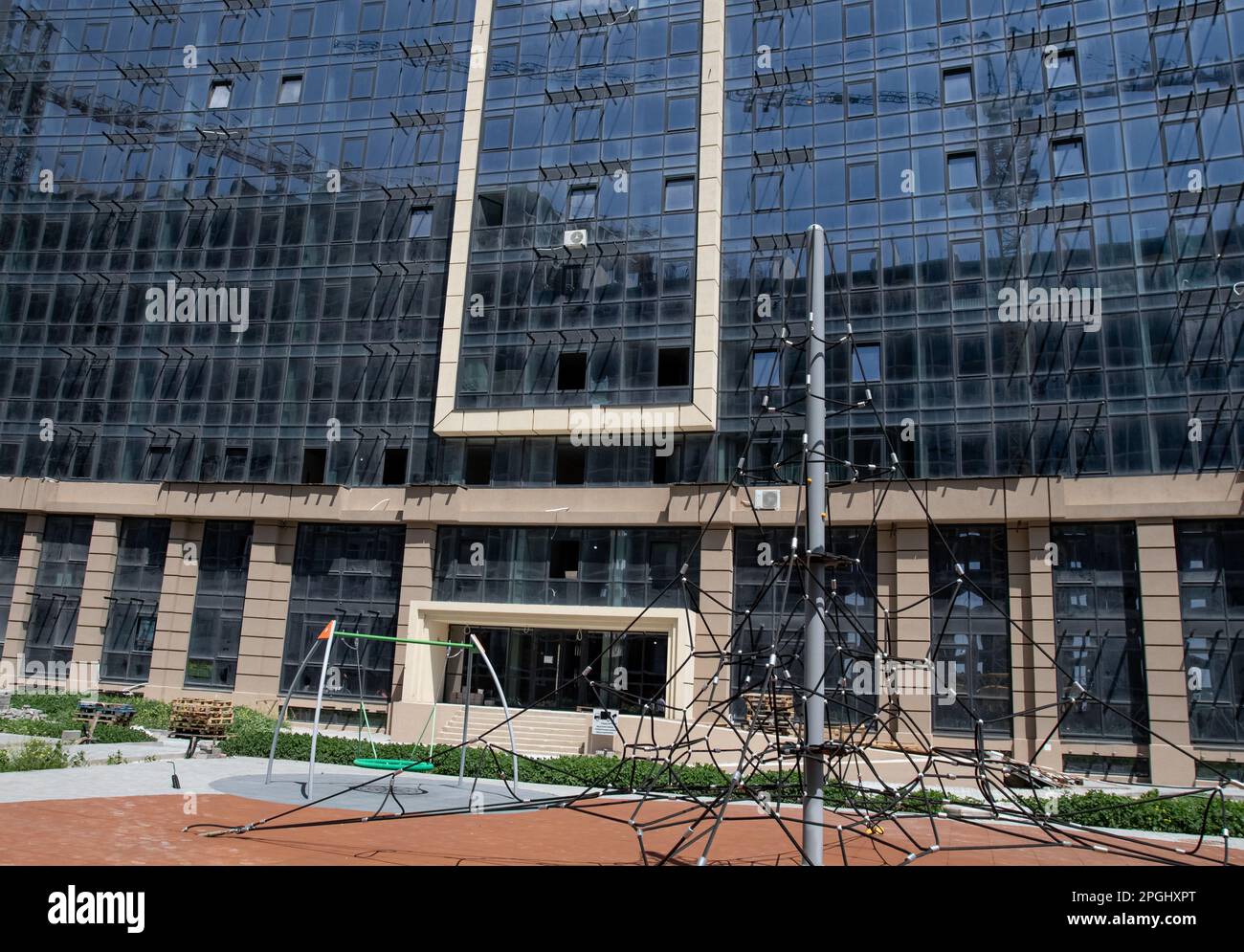Construction of a modern high-rise building. Real estate and corporate ... Construction of a modern high-rise building. Real estate and corporate ...