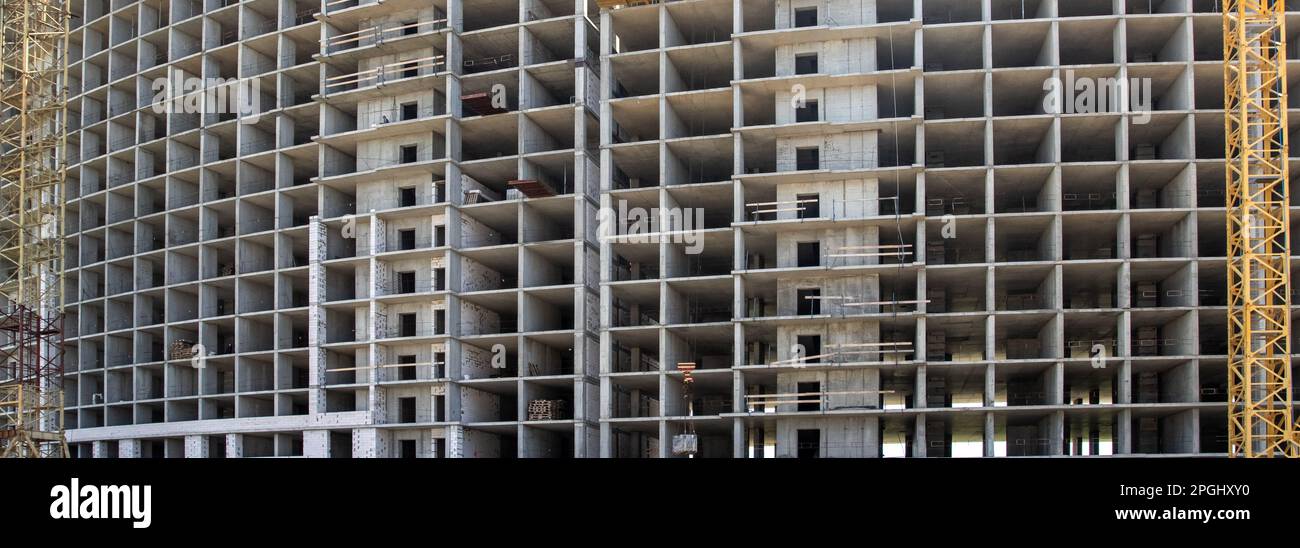 Construction of a modern high-rise building. Real estate and corporate ...