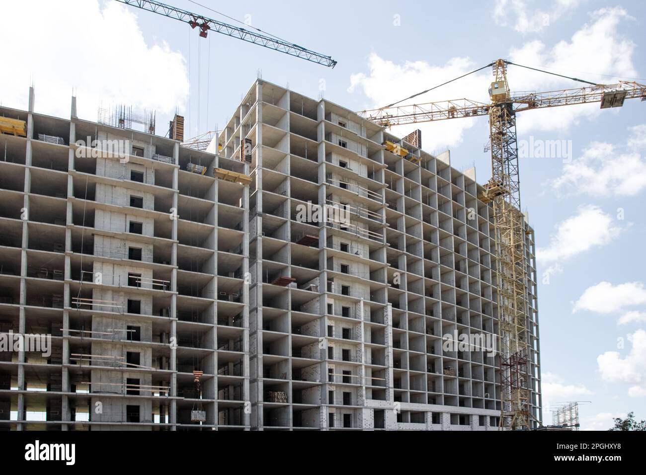 Construction of a modern high-rise building. Real estate and corporate ...
