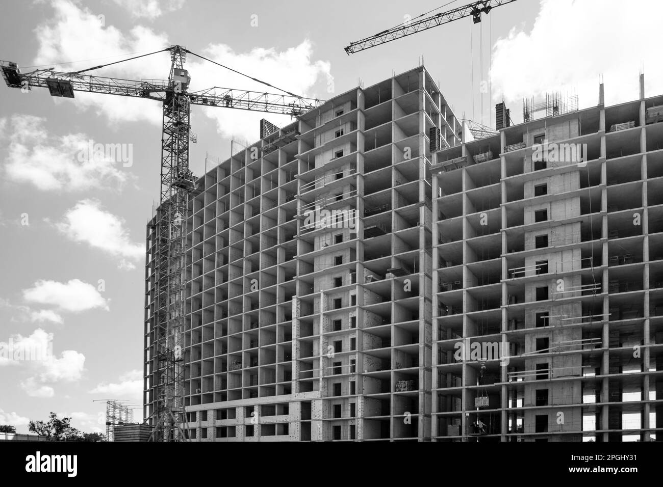 Construction of a modern high-rise building. Real estate and corporate ... Construction of a modern high-rise building. Real estate and corporate ...