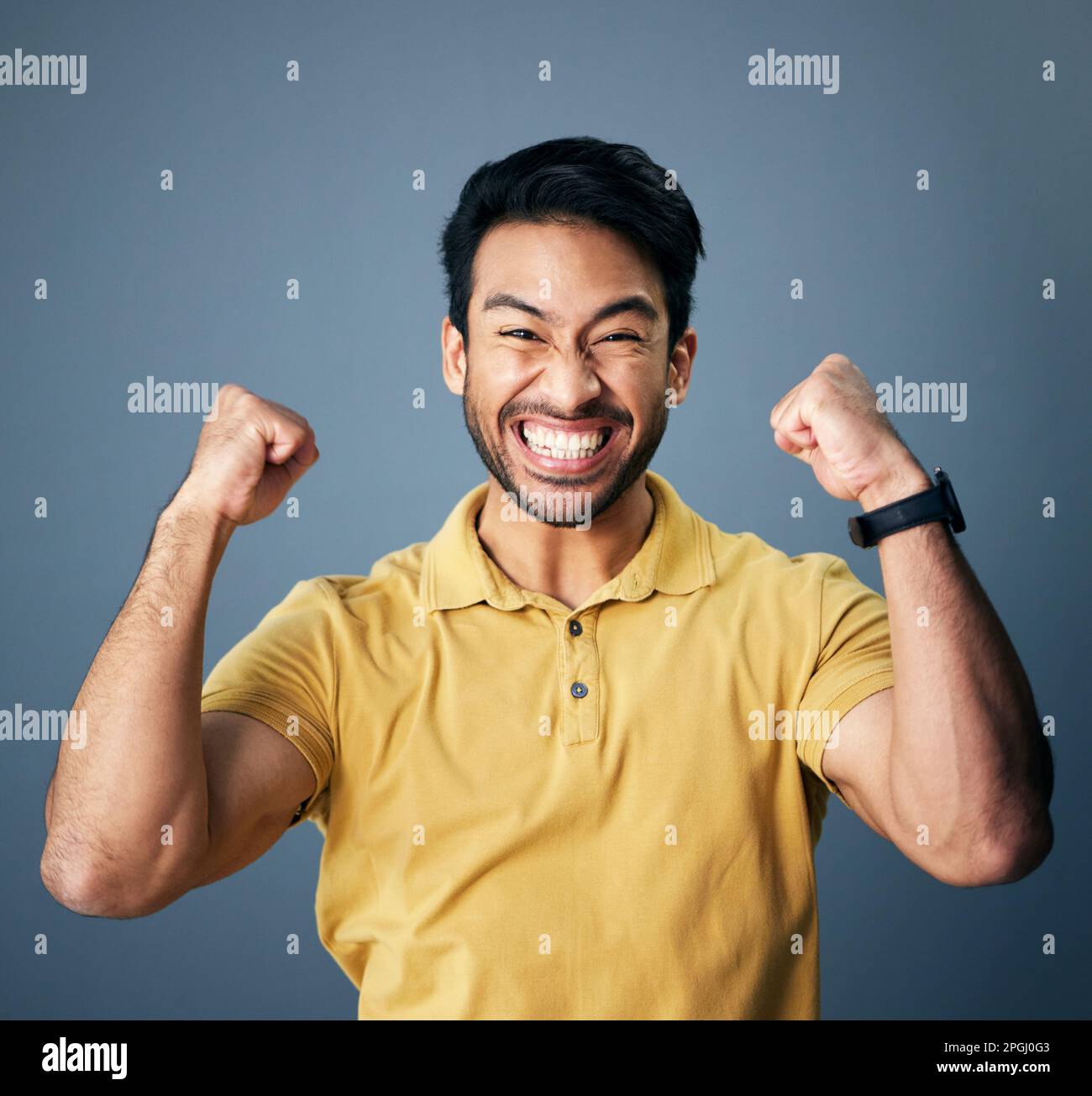Indian man, excited celebration and studio portrait for winning mindset ...