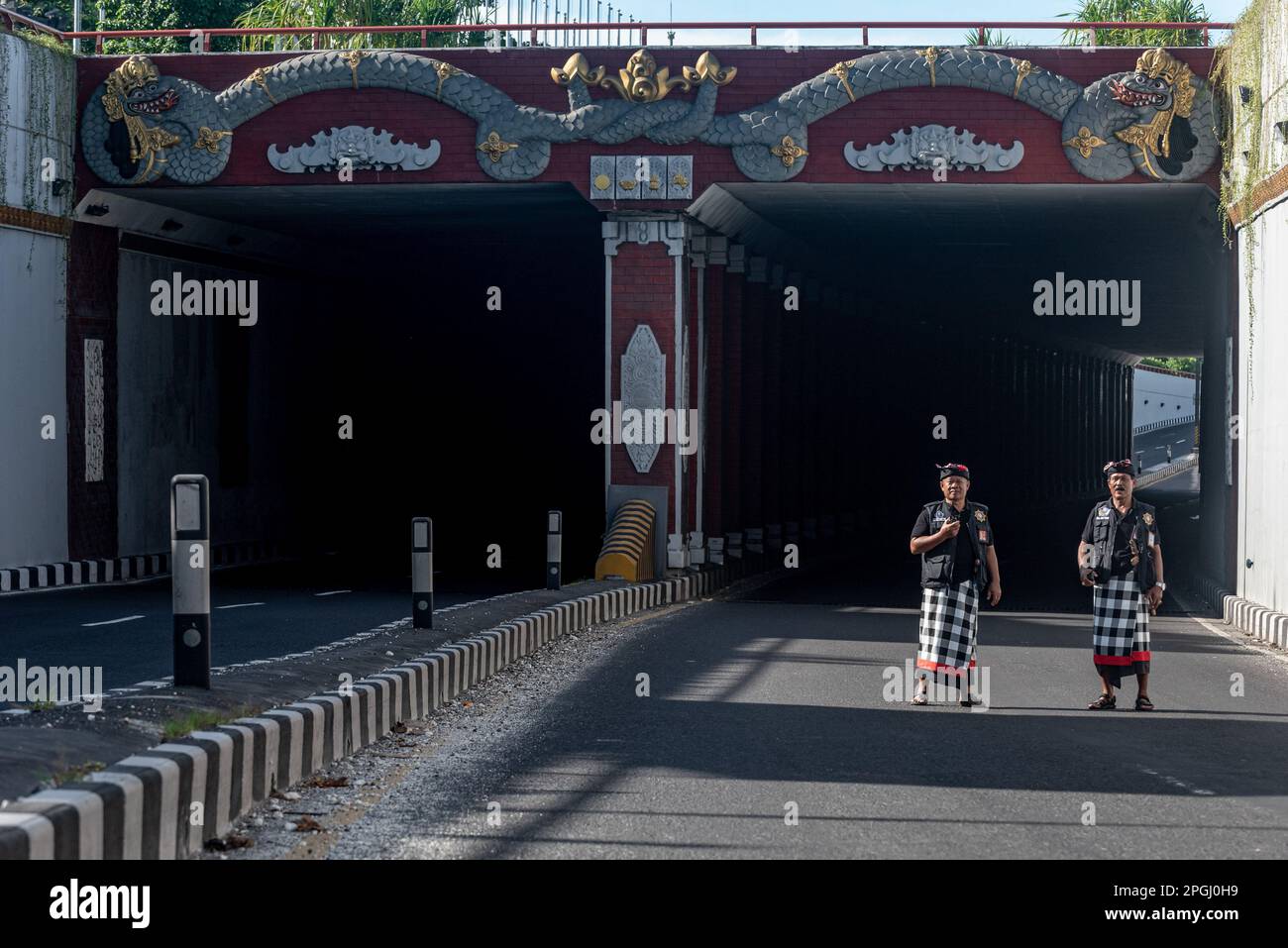 Badung, Indonesia. 22nd Mar, 2023. Two Bali traditional security guards ...