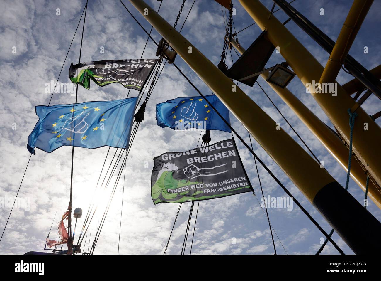 23 March 2023, Schleswig-Holstein, Büsum: Protest flags hang on board a ...