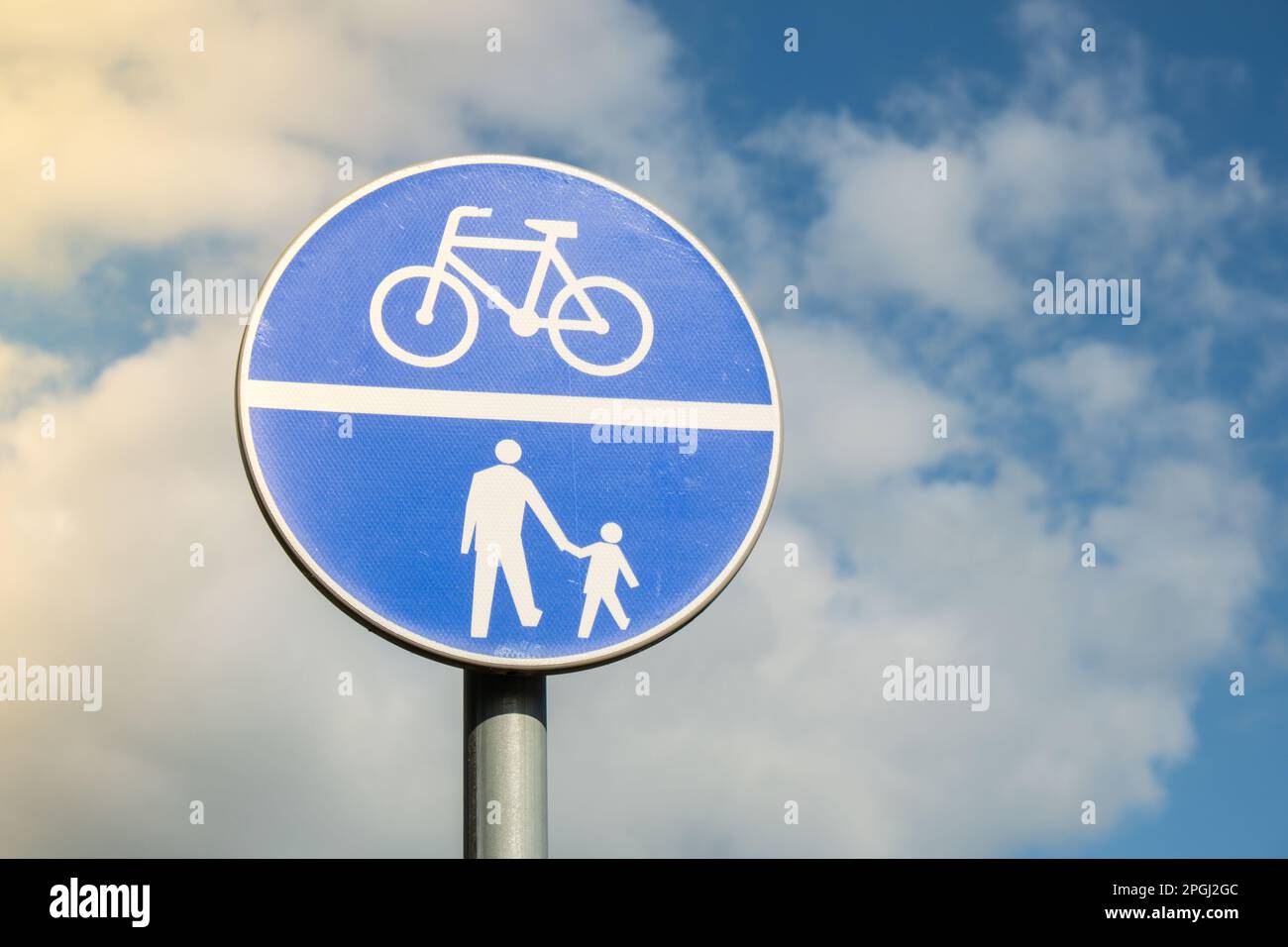 Cyclist and pedestrian route sharing sign. Road sign Pedestrian and ...