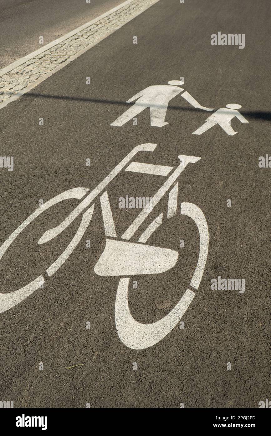 Cyclist and pedestrian route zone on a street. Painted Street Asphalt ...