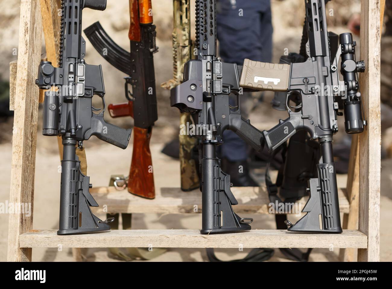 Modern American assault rifle equipped with magniers and optical scopes ...