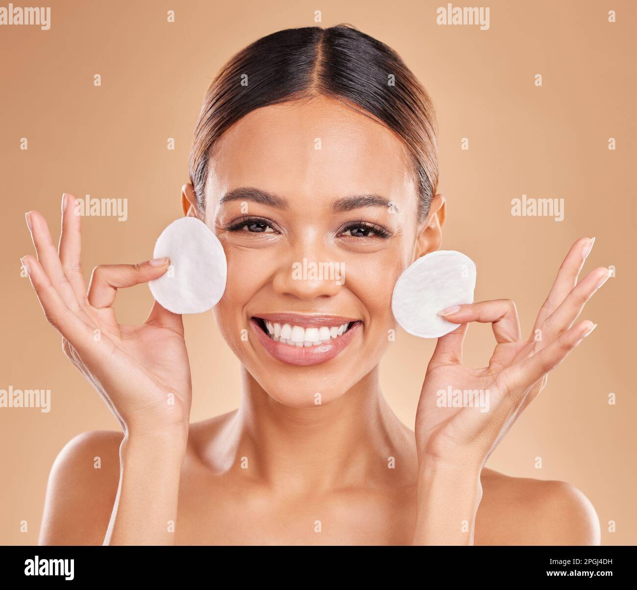 Face, dermatology and woman with cotton pad, organic facial and smile ...