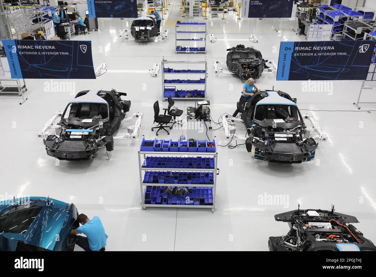 Employee working on an assembly line producing Electric Hyper car Rimac ...