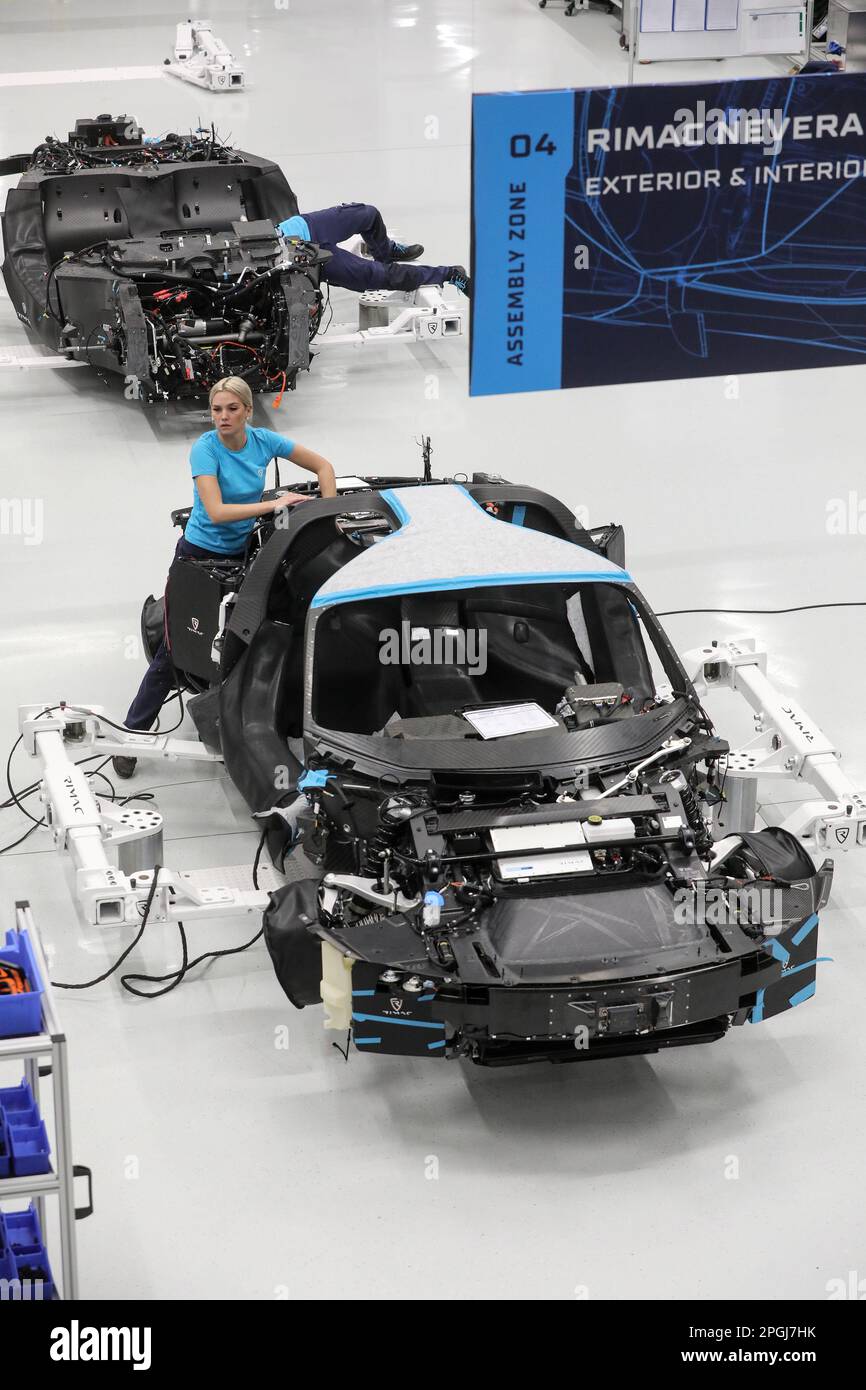 Employee working on an assembly line producing Electric Hyper car Rimac ...