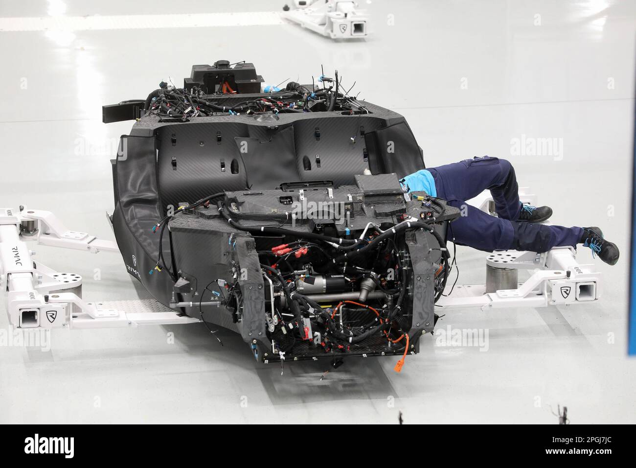 Employee working on an assembly line producing Electric Hyper car Rimac ...