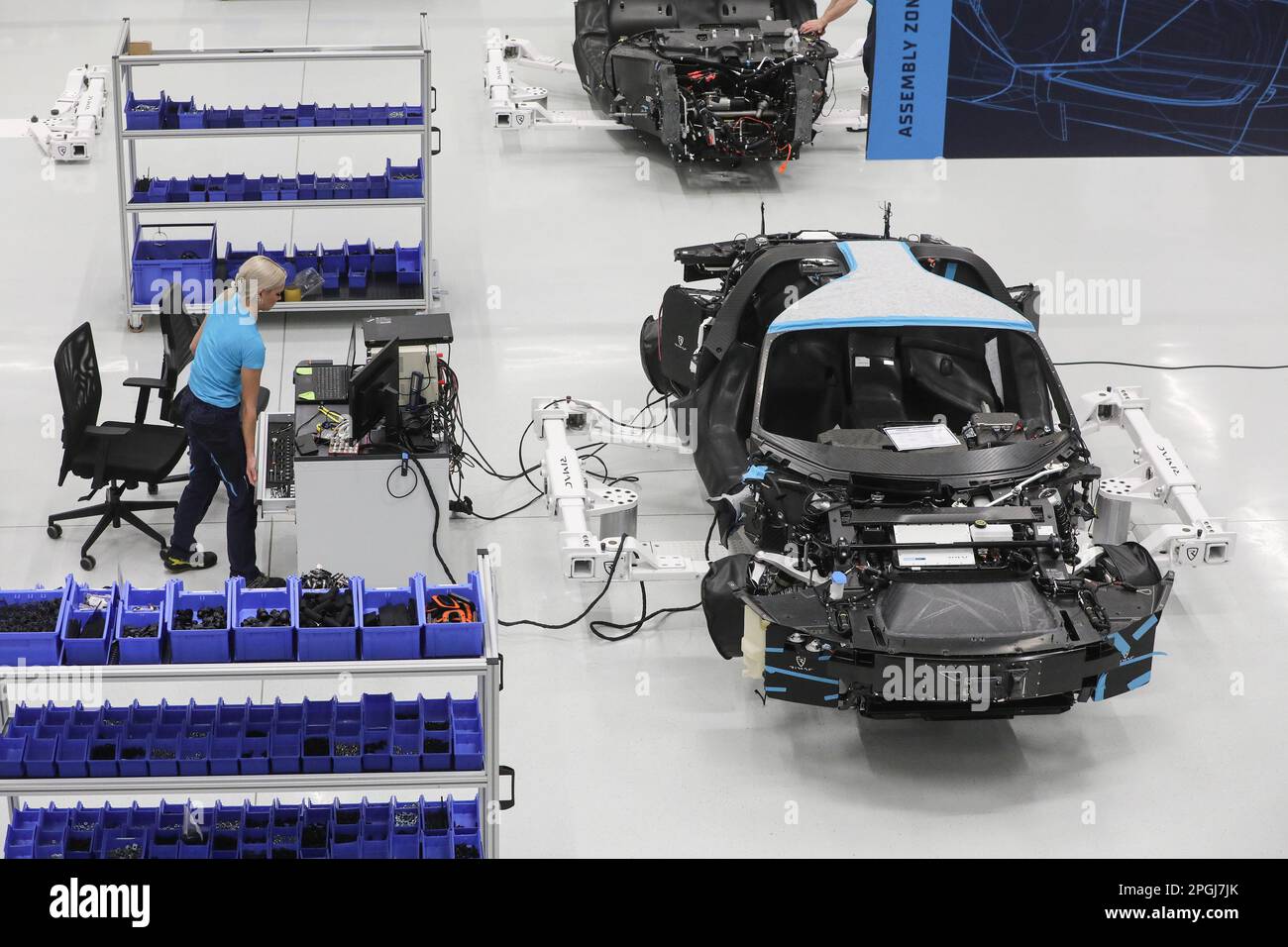 Employee working on an assembly line producing Electric Hyper car Rimac ...