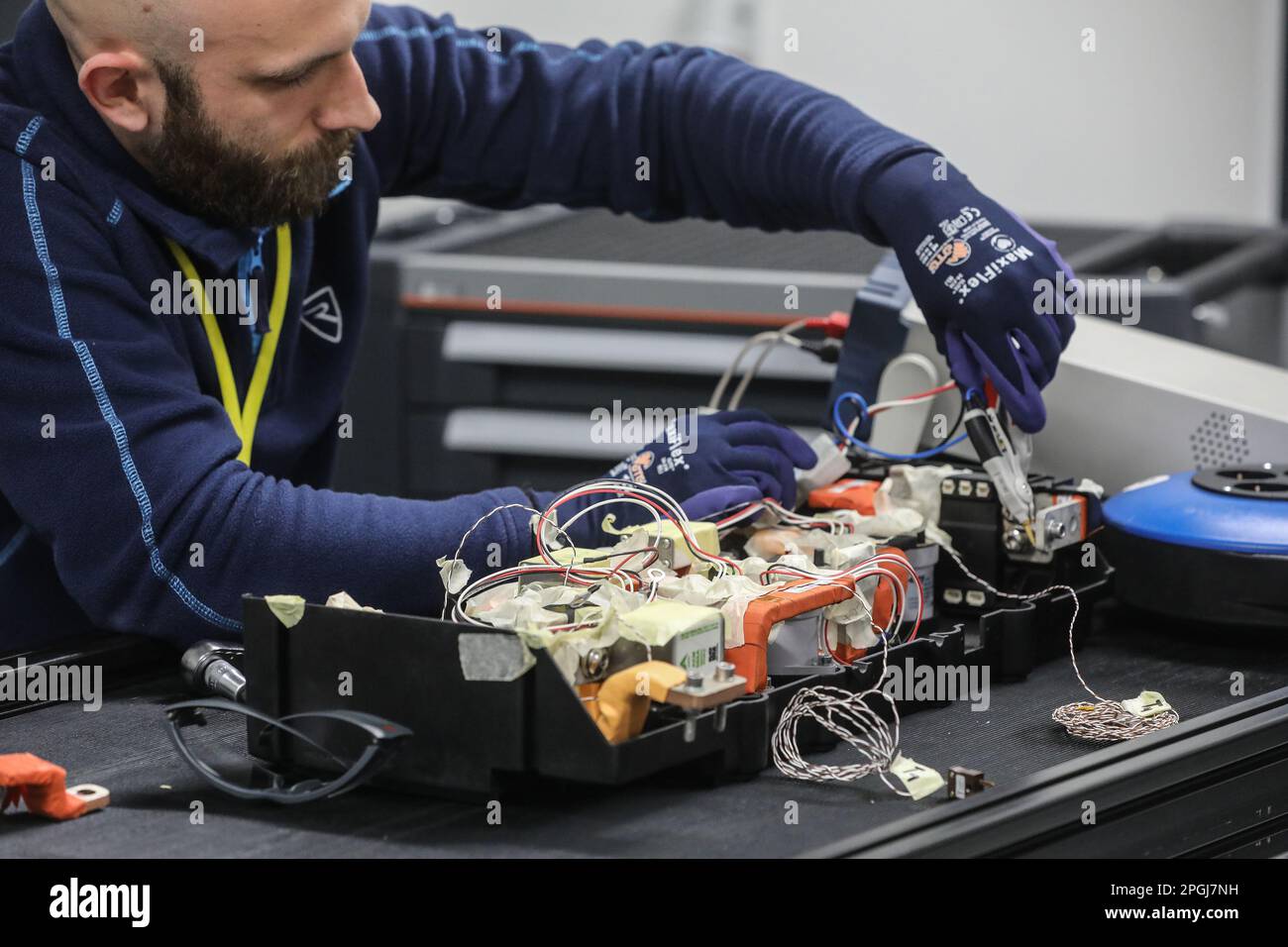 Employee working on an assembly line producing Electric Hyper car Rimac ...