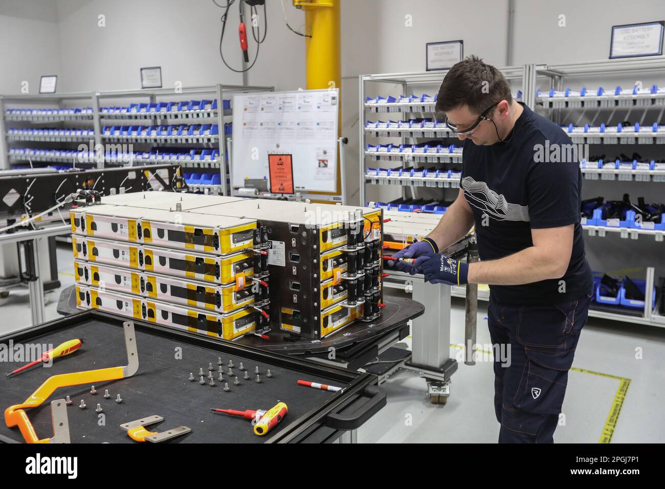 Employee working on an assembly line producing Electric Hyper car Rimac ...