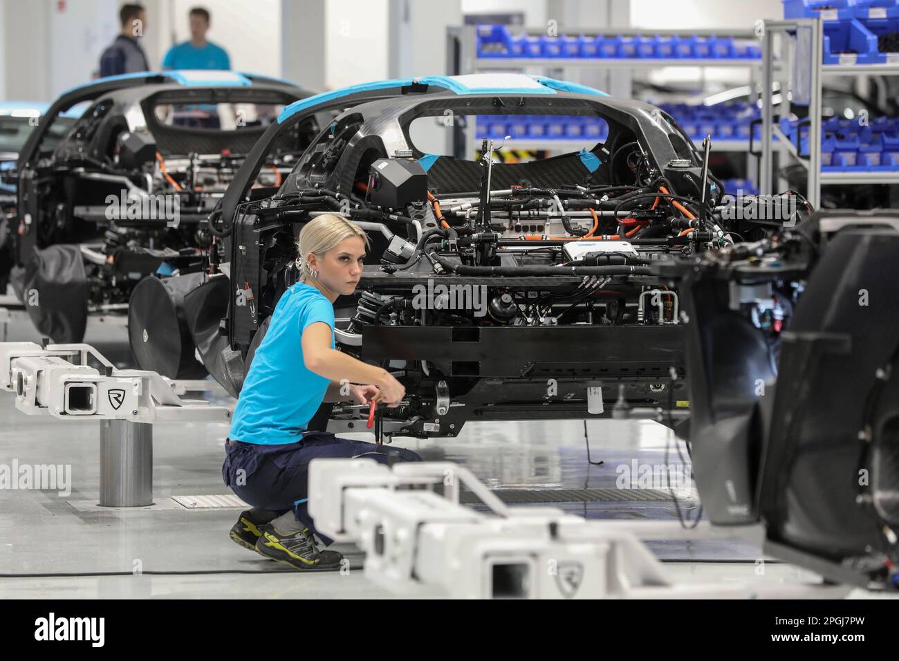 Employee working on an assembly line producing Electric Hyper car Rimac ...
